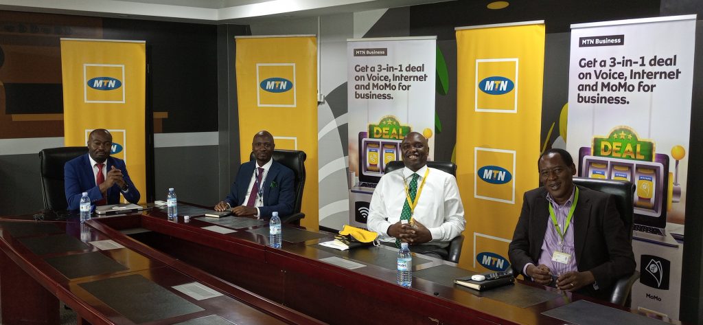 In Pic (right - left): Badru Ntege; CEO NFT Consult Group, Stephen ...
